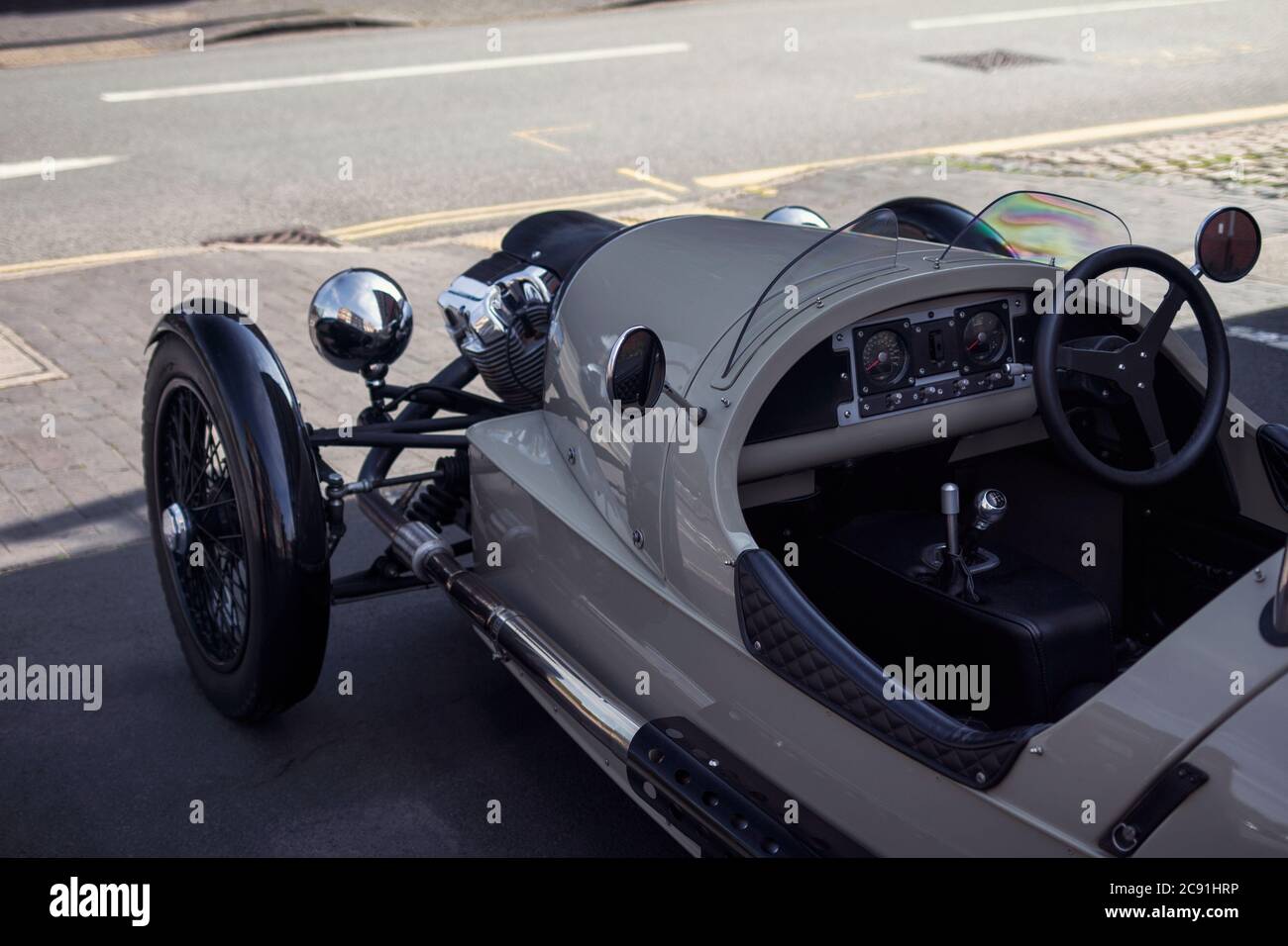 Grey Morgan 3-Wheeler modern sports car parked on a street in central ...