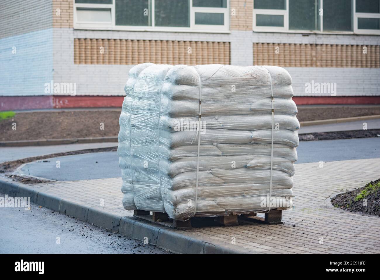Big bags with soil on the pallet by the construction site Stock Photo ...
