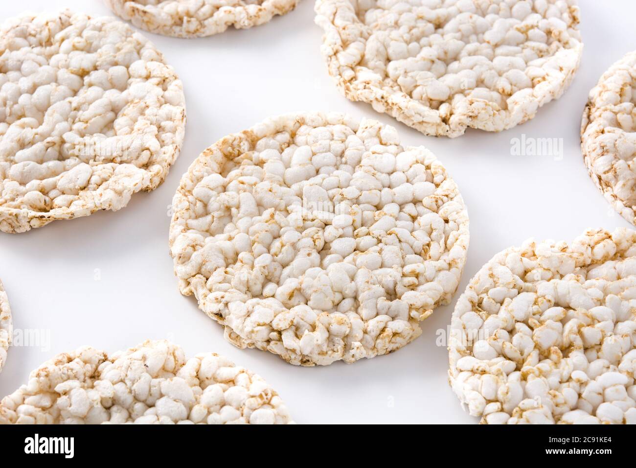 Puffed rice cakes isolated on white background Stock Photo - Alamy