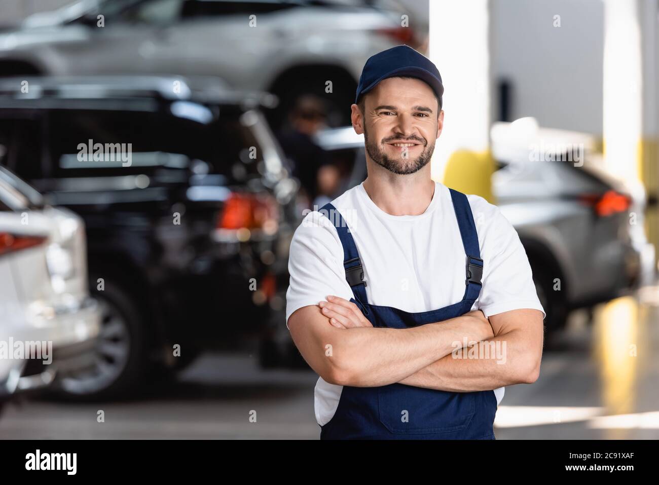Happy mechanic hi-res stock photography and images - Alamy