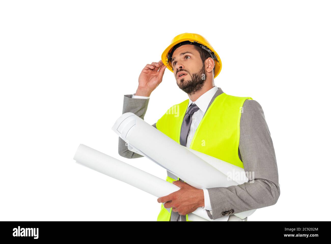 Engineer in suit holding hardhat and blueprints isolated on white Stock ...