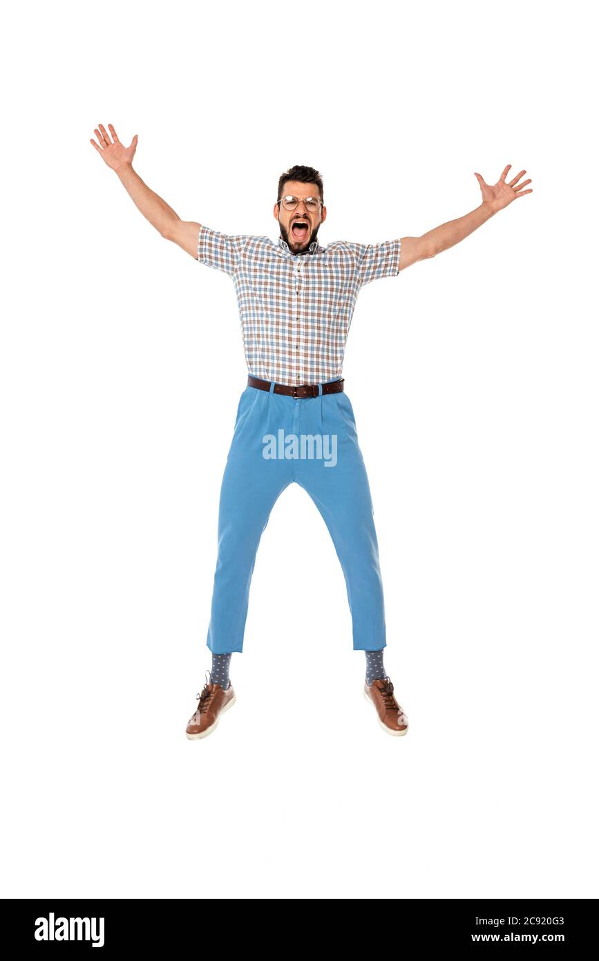 Excited nerd with raised hands looking at camera isolated on white ...