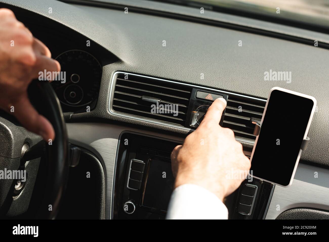 Cropped hands of man driving car hi-res stock photography and images ...