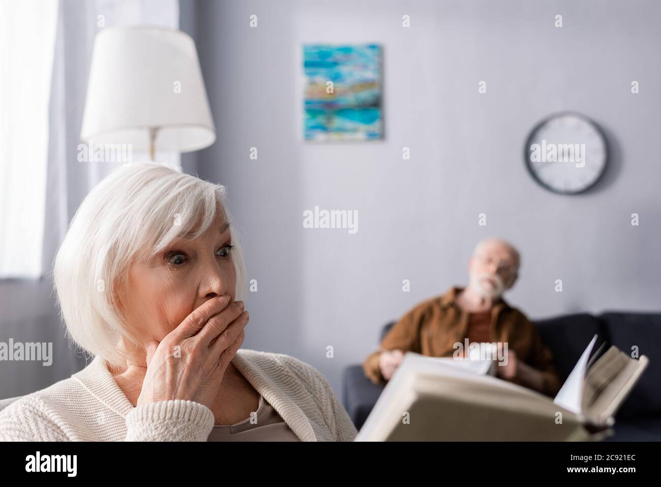Two people shocked reading book hi-res stock photography and images - Alamy