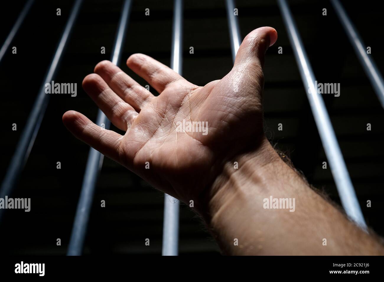 Inmate prison bars hi-res stock photography and images - Alamy