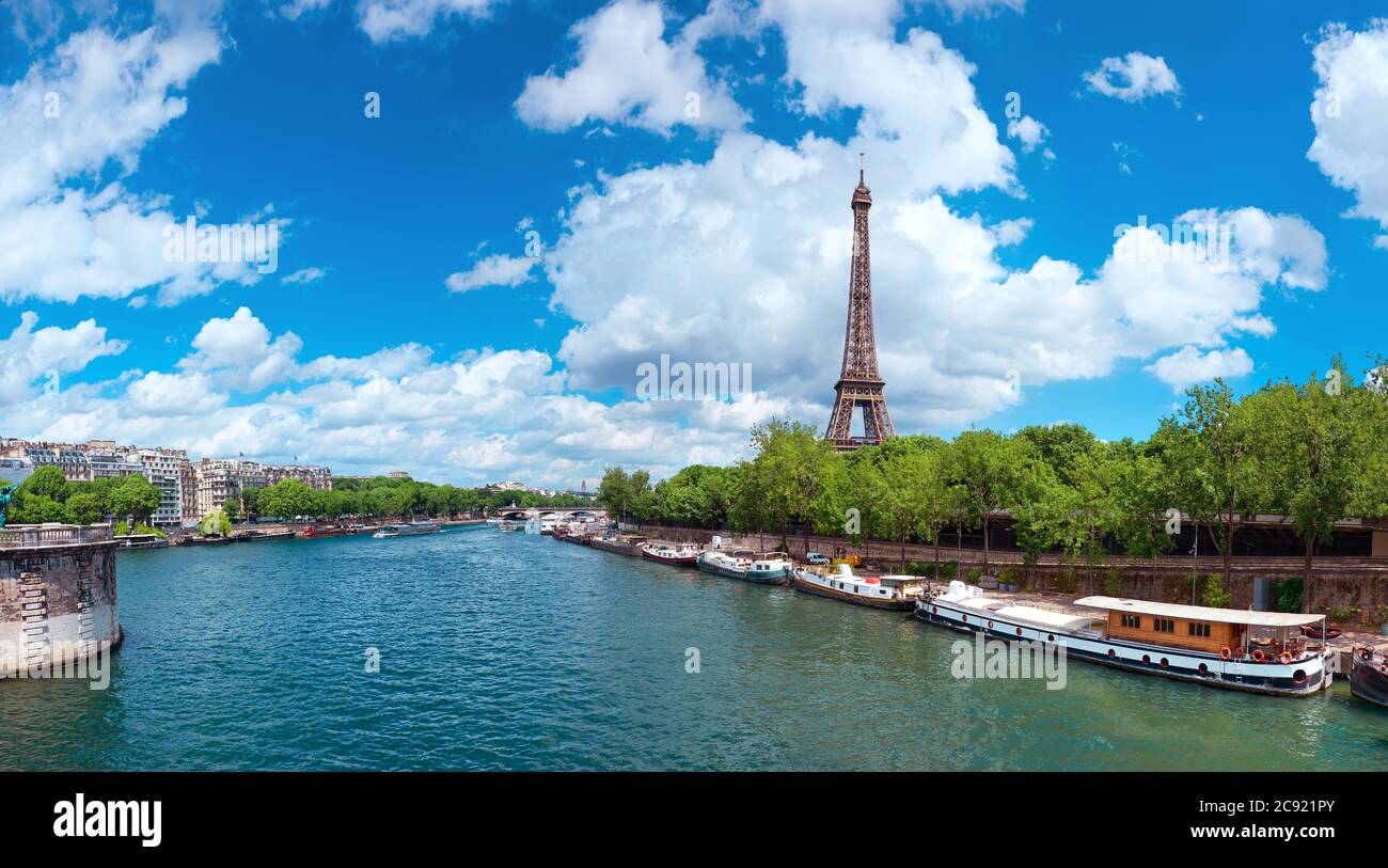 Romantic Paris, panoramic view of riverside with Eiffel tower in Summer ...