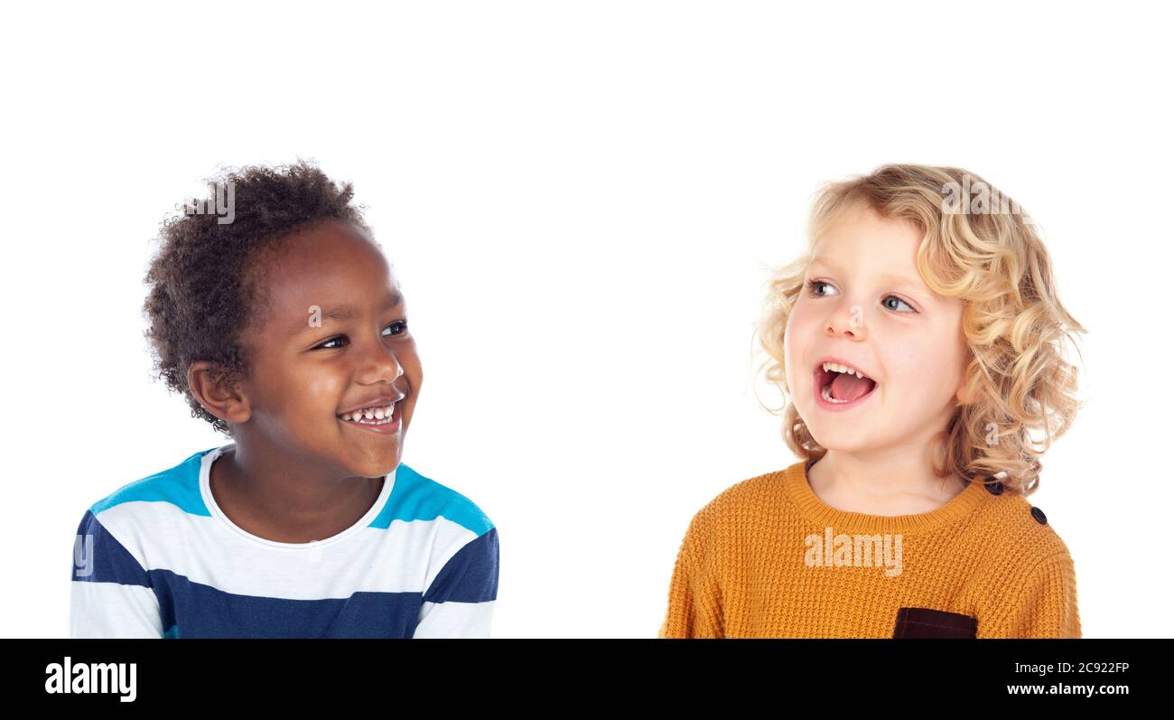 Two adorable children of different races isolated on a white background ...