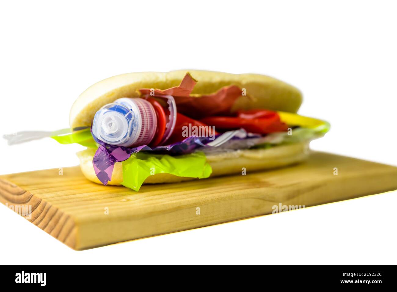 Dog eating trash Cut Out Stock Images & Pictures - Alamy