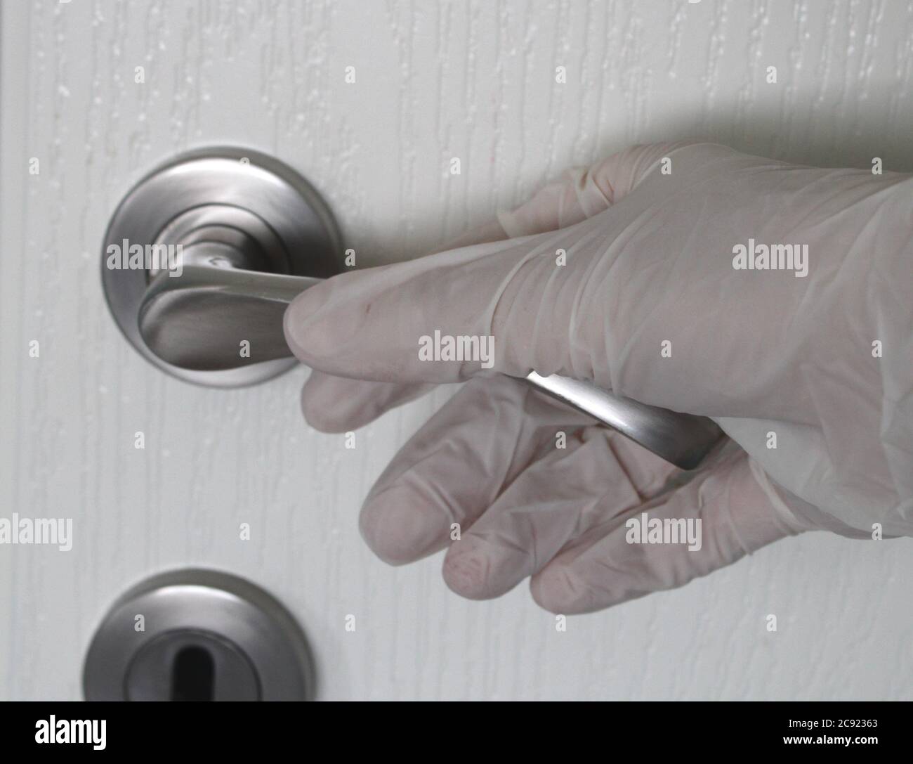 Hospital glove door hi-res stock photography and images - Alamy