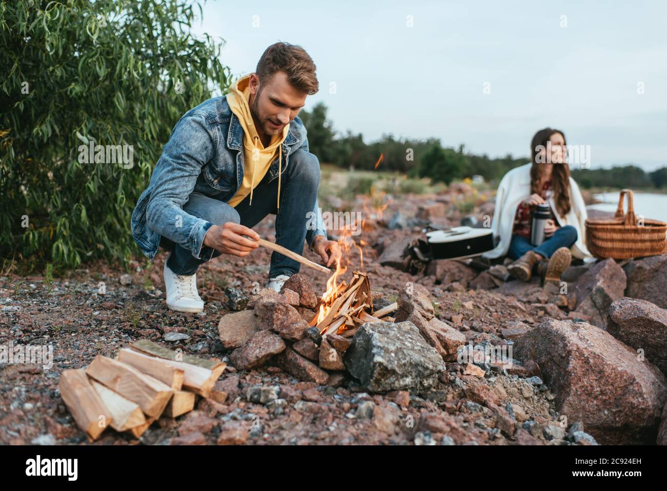 Man holding stick hi-res stock photography and images - Alamy