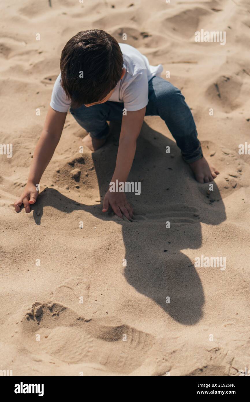 Touching sand hi-res stock photography and images - Alamy