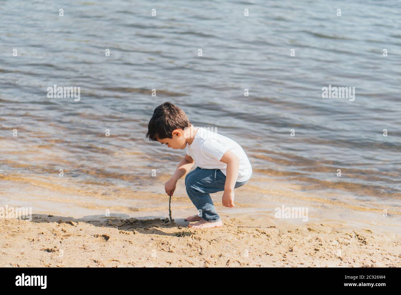 Barefoot boy hi-res stock photography and images - Alamy