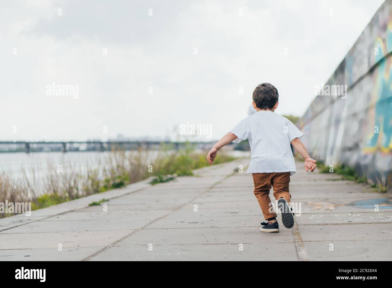 Boy in white t shirt hi-res stock photography and images - Alamy