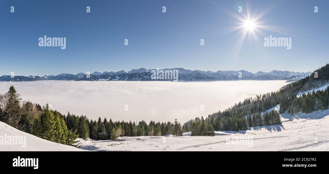 Fantastic panoramic view of snow mountains with blue Sky and Sun. Great ...