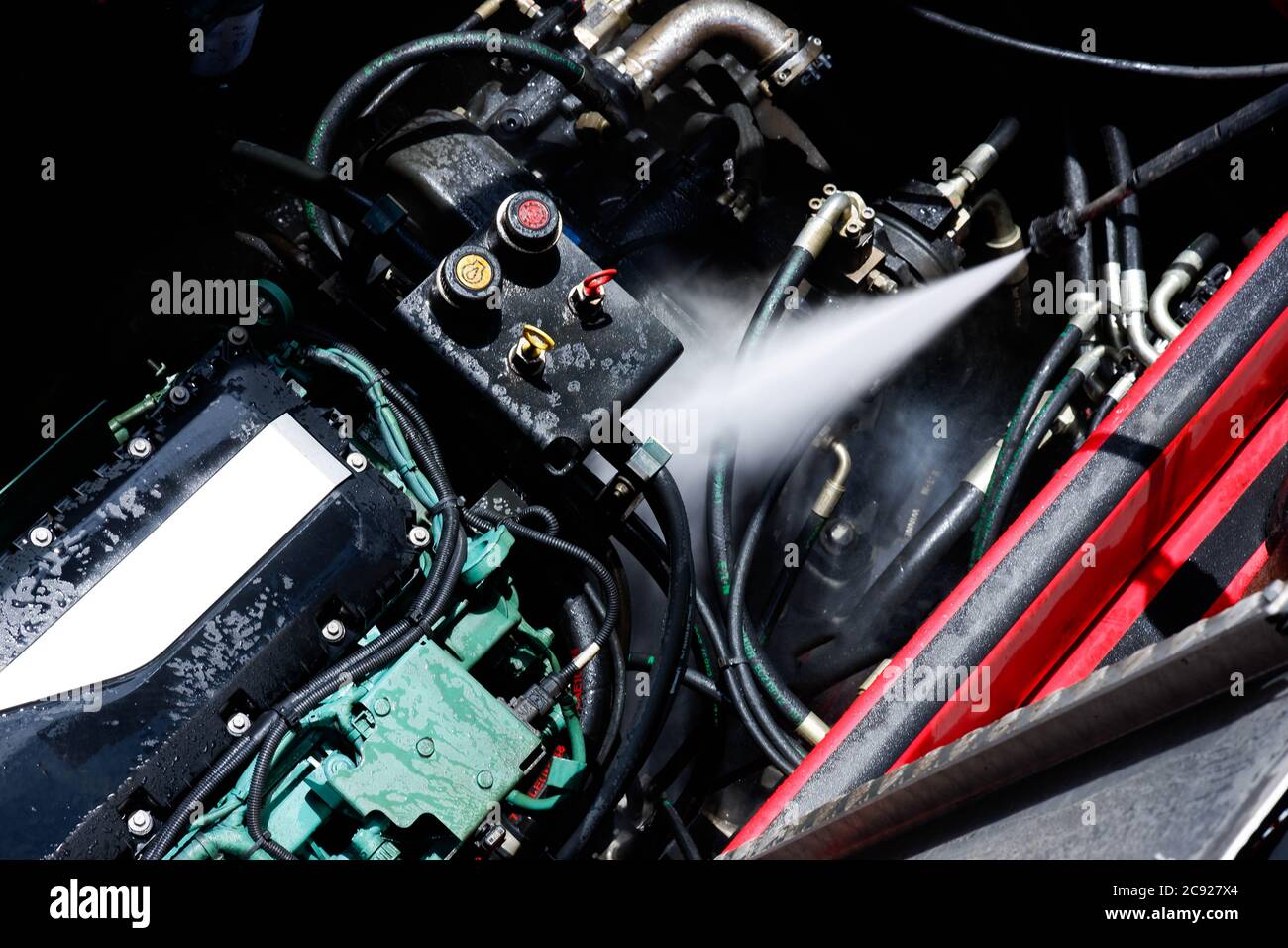 Washing the engine with high water pressure Stock Photo - Alamy