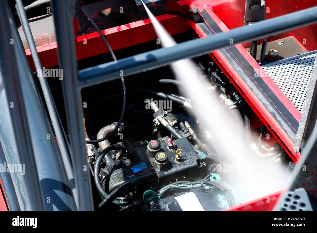 Washing the engine with high water pressure Stock Photo - Alamy