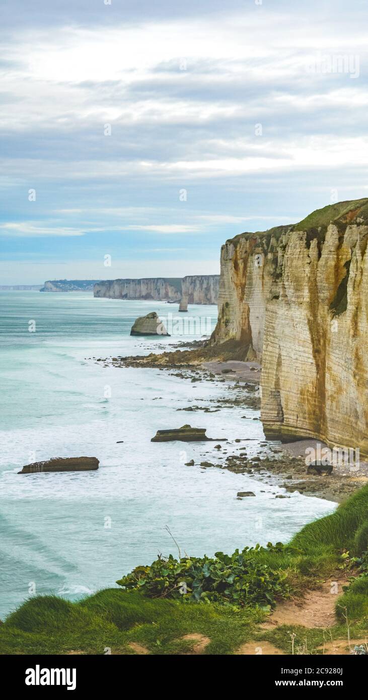 Orange cliff with blue sky Stock Photo - Alamy