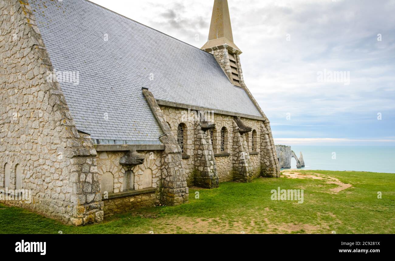 Church with view on Etretat Cliff Stock Photo - Alamy