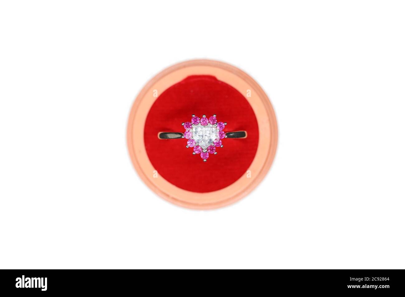 twelve pink and one white silver shiny ring for girls on white ...