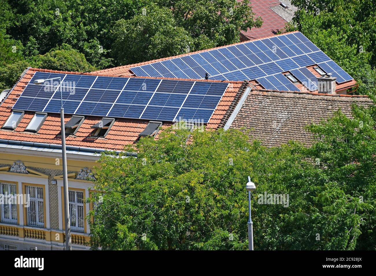 Solar panels on the top of a building Stock Photo - Alamy