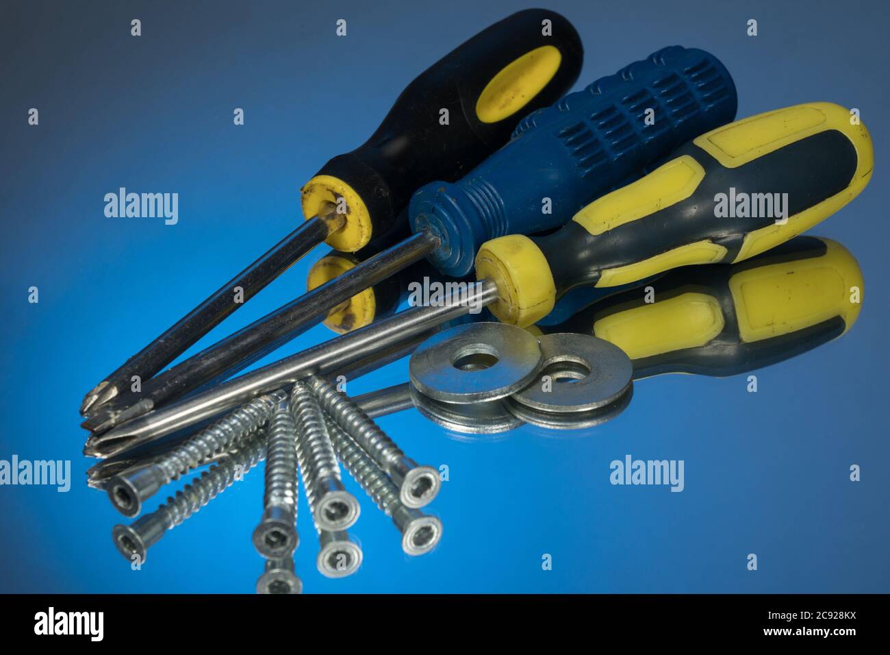 Screwdriver Set isolated on blue background. mirror reflection Stock ...