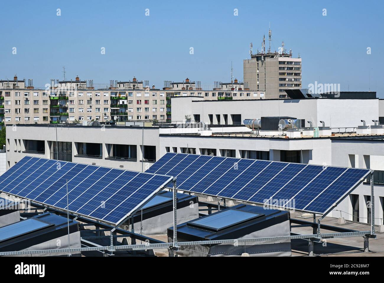 Solar panels on the top of a building Stock Photo - Alamy