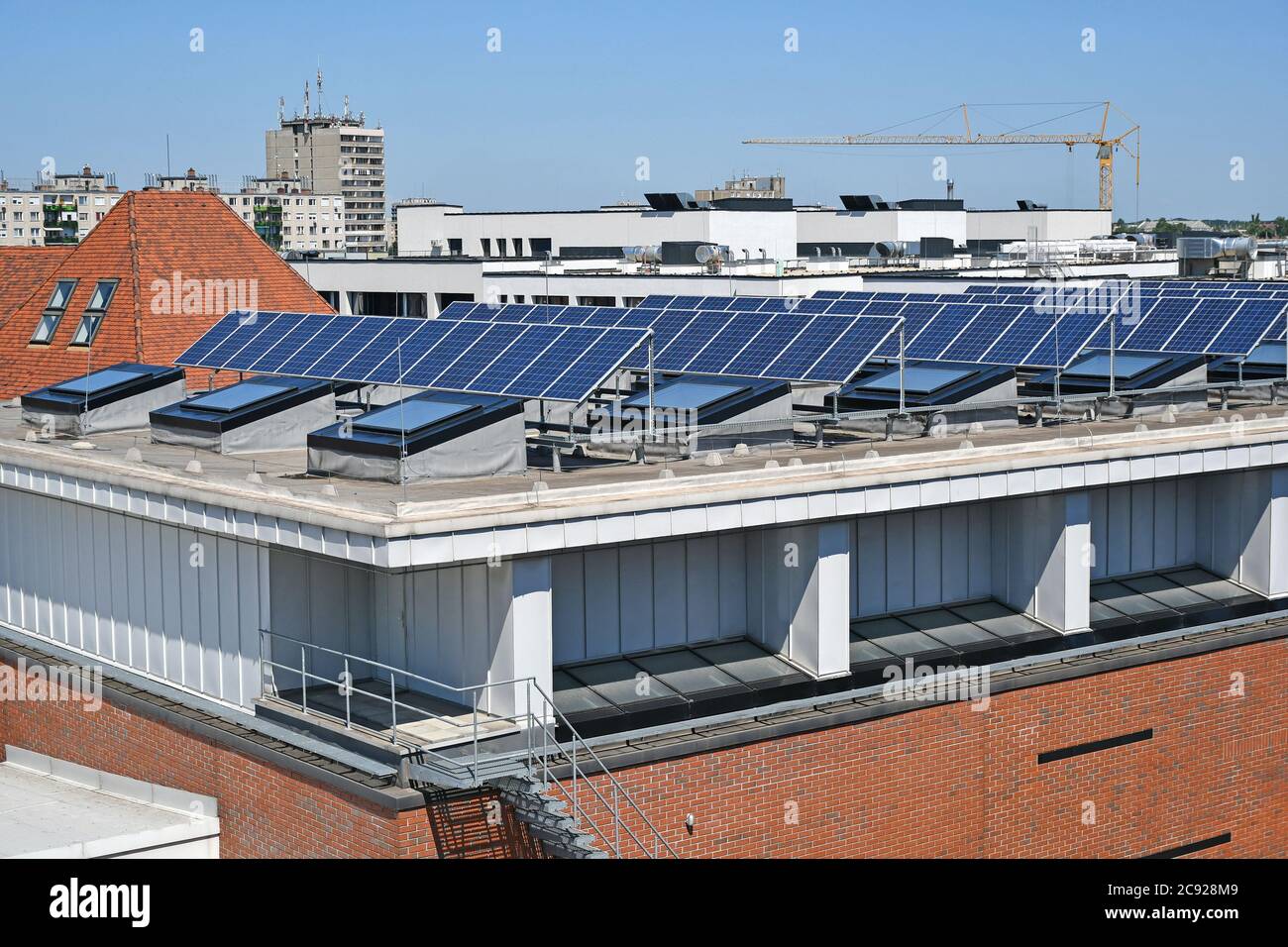 Solar panels on the top of a building Stock Photo - Alamy