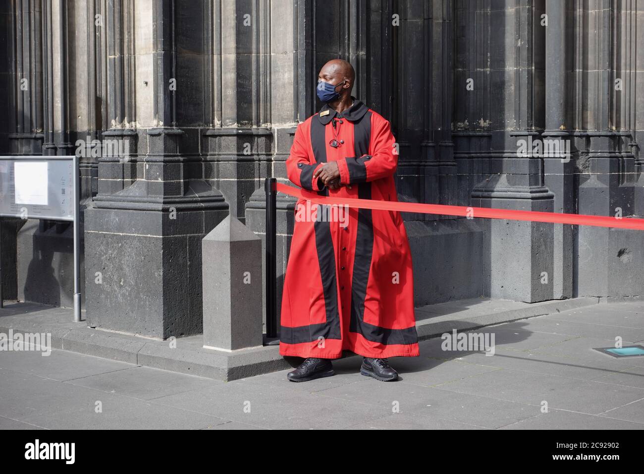 COLOGNE, GERMANY - Jun 27, 2020: Catholic priest with face mask in ...
