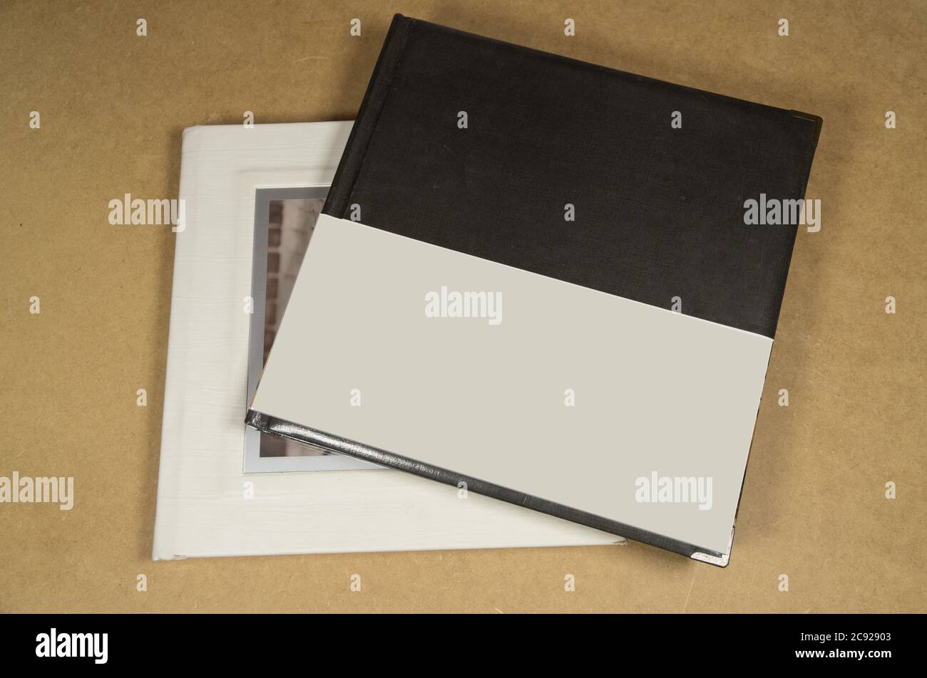 Photo album over wooden background. Close-up, books Stock Photo - Alamy