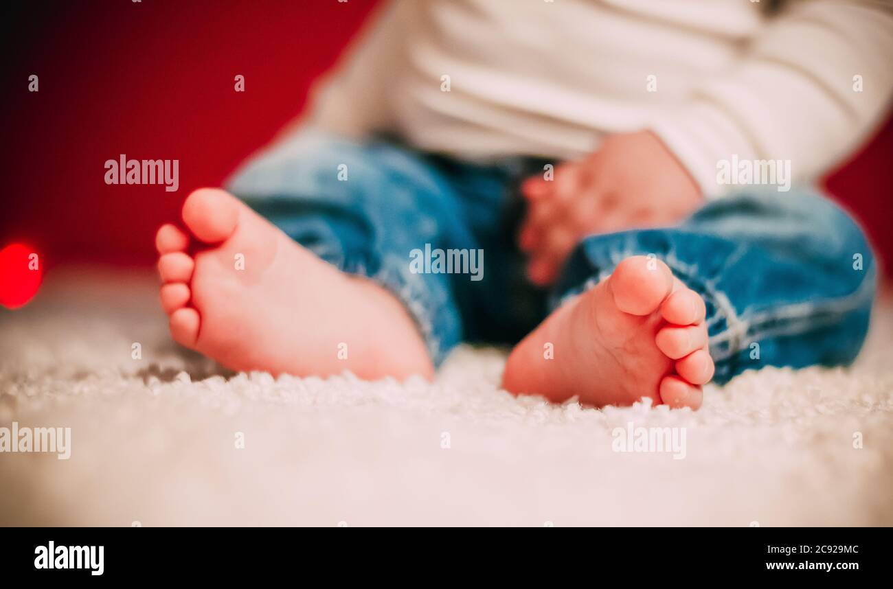 Baby, bird's eye shot, lower body Stock Photo - Alamy