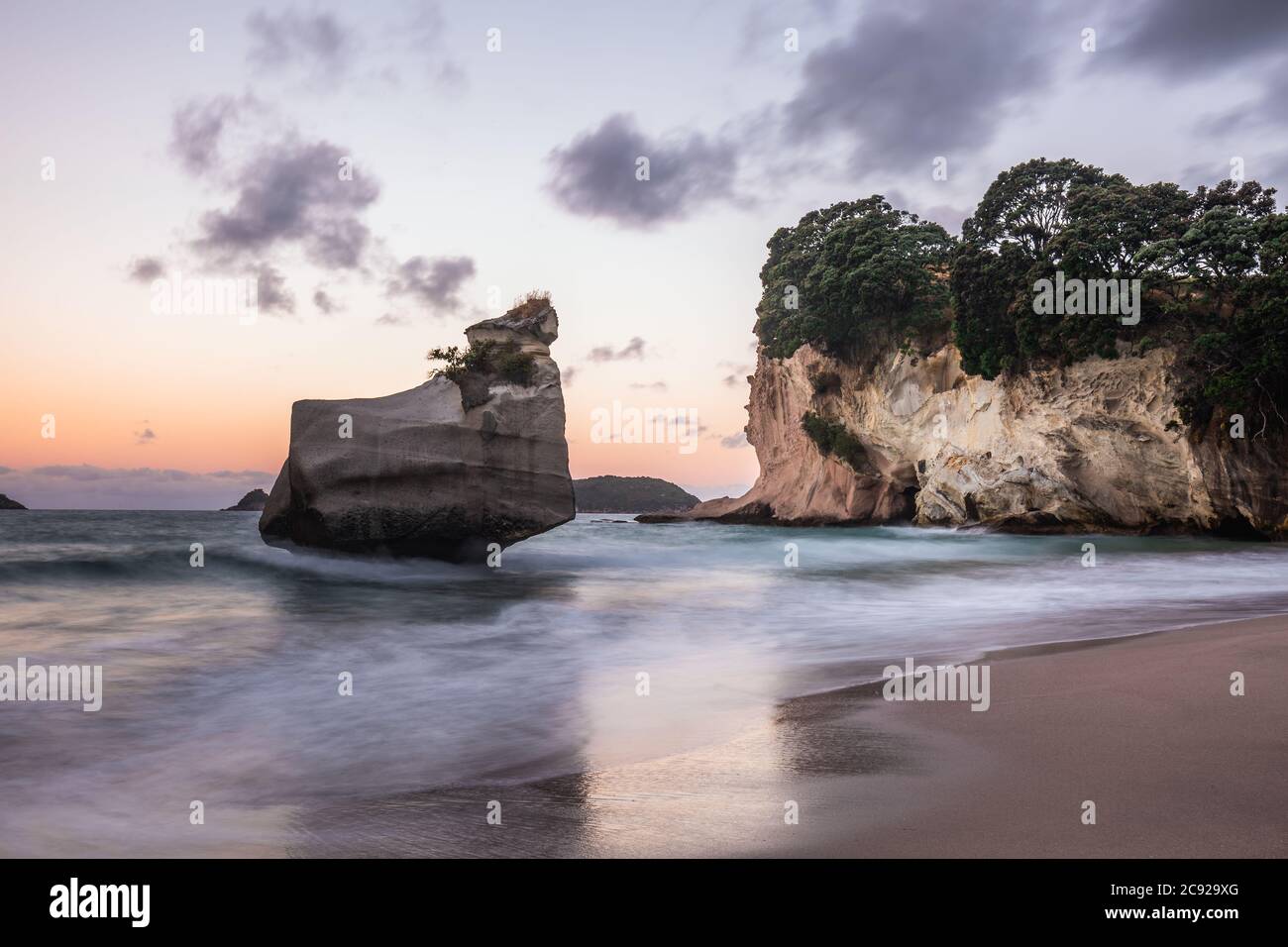 Cathedral Cove at sunset, Coromandel Peninsula, New Zealand Stock Photo ...