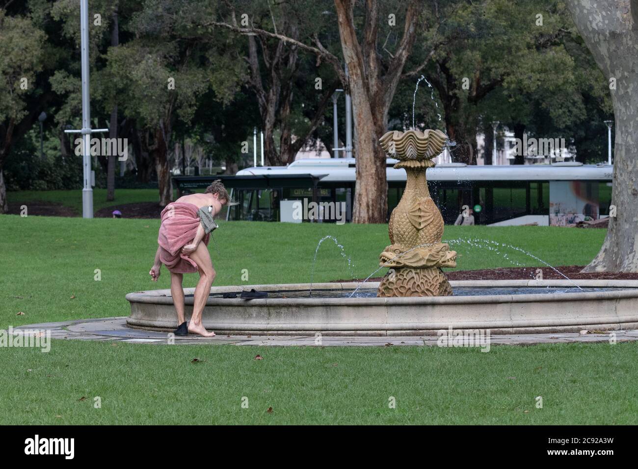 Homeless man washing in public fountian hi-res stock photography and ...