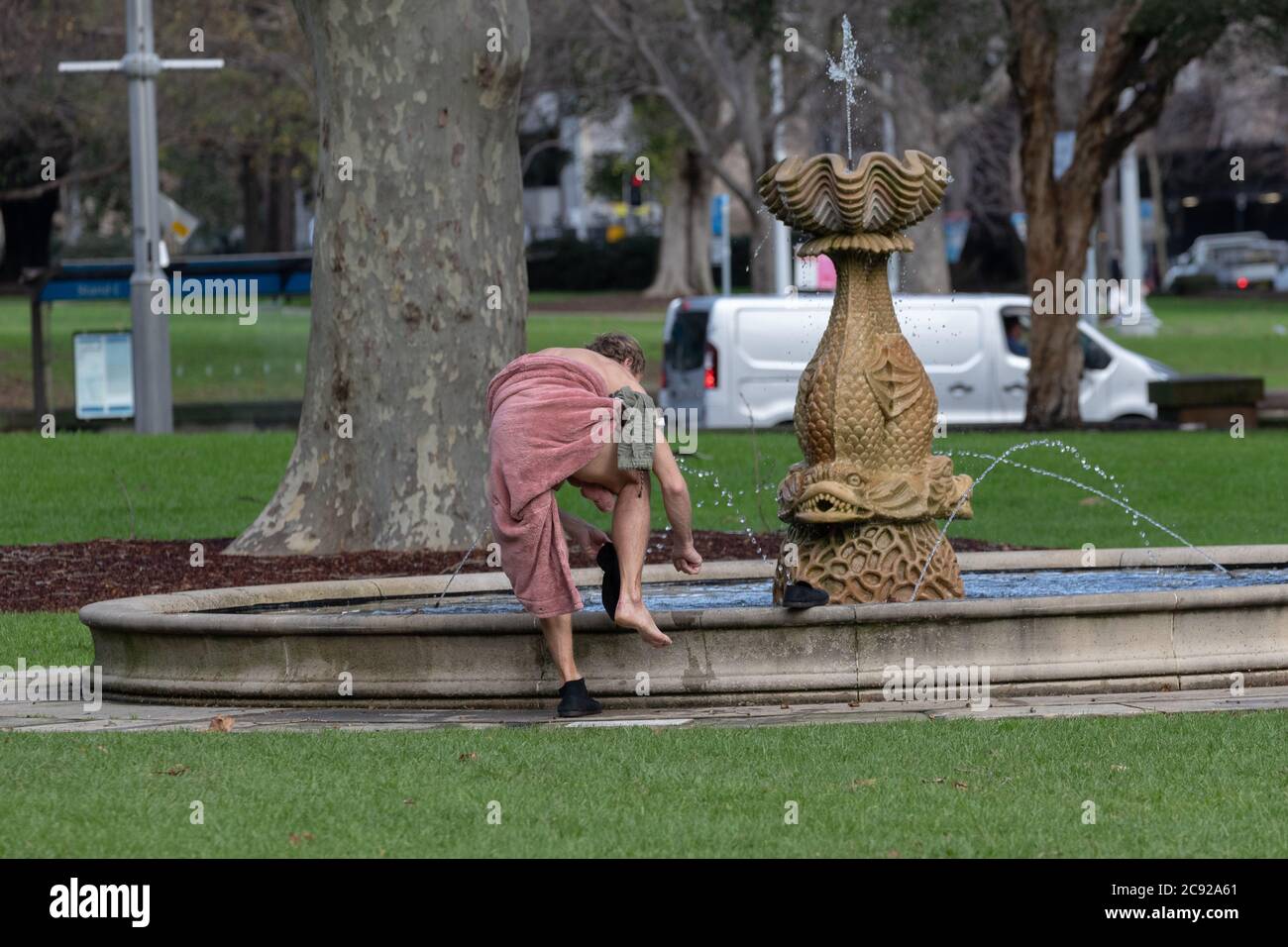 Homeless man washing in public fountian hi-res stock photography and ...