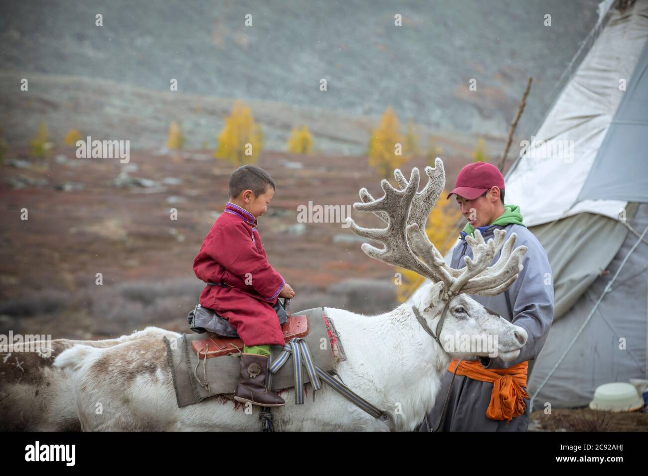 Riding a reindeer hi-res stock photography and images - Alamy