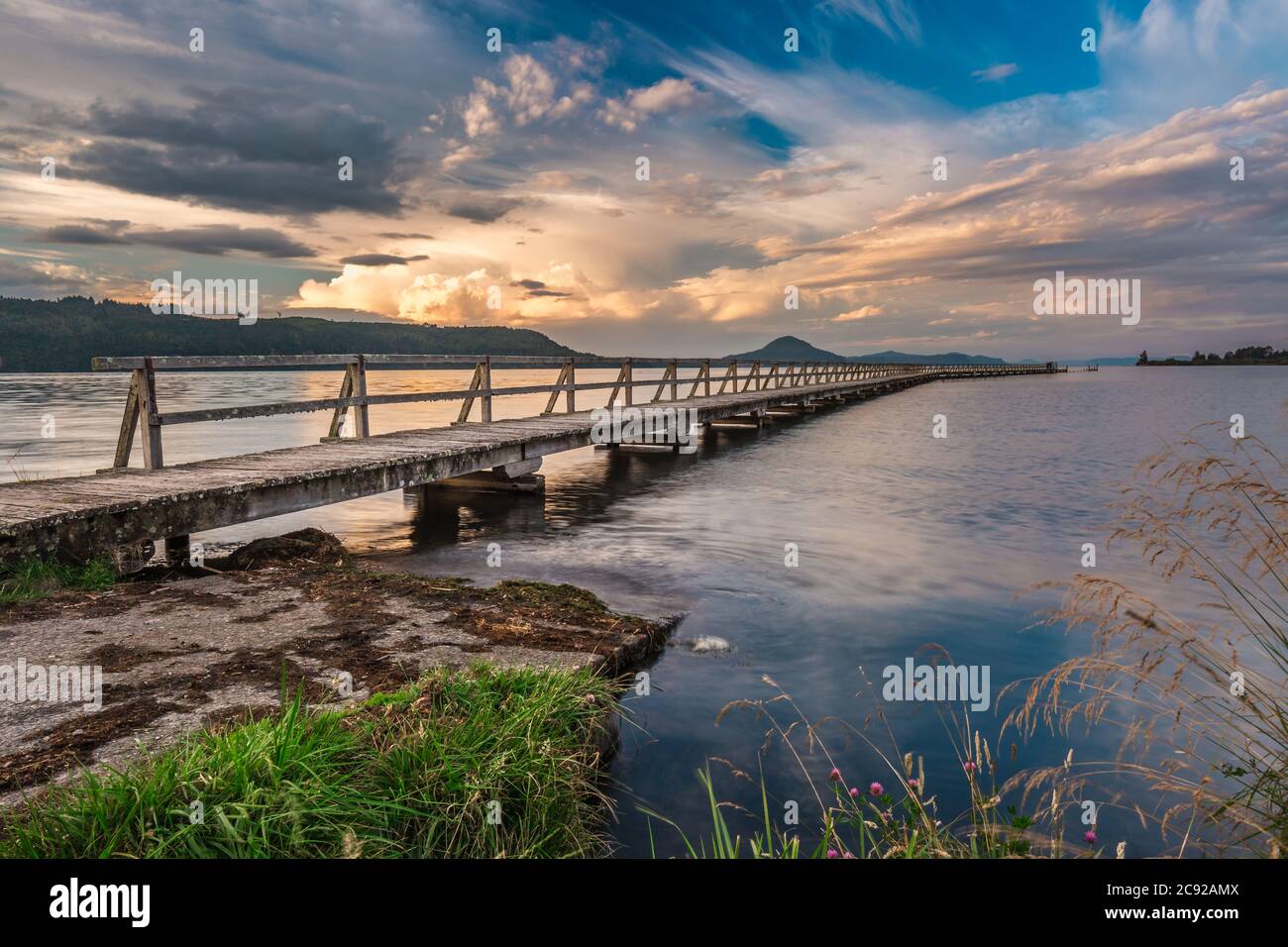 Old wooden wharf shot with long exposure during sunset. Location is ...