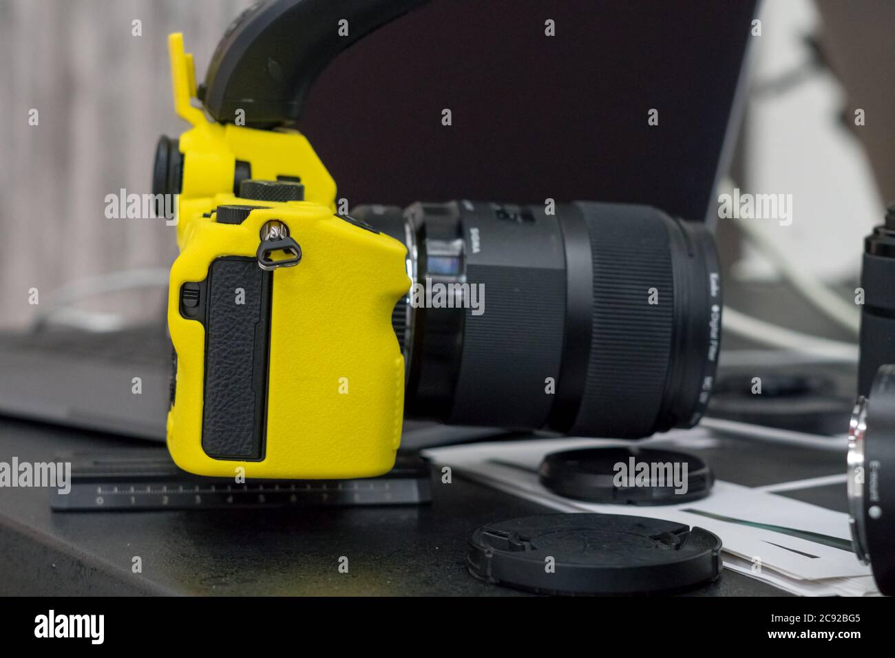 Digital camera, lens and laptop. concept of photographer work station ...