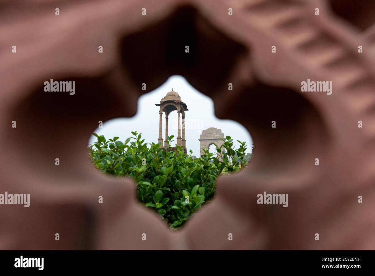 View of the India Gate monument through a frame of the surrounding ...