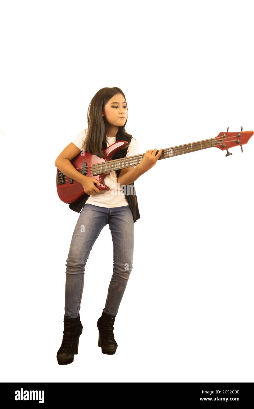 Girl playing bass guitar hi-res stock photography and images - Alamy