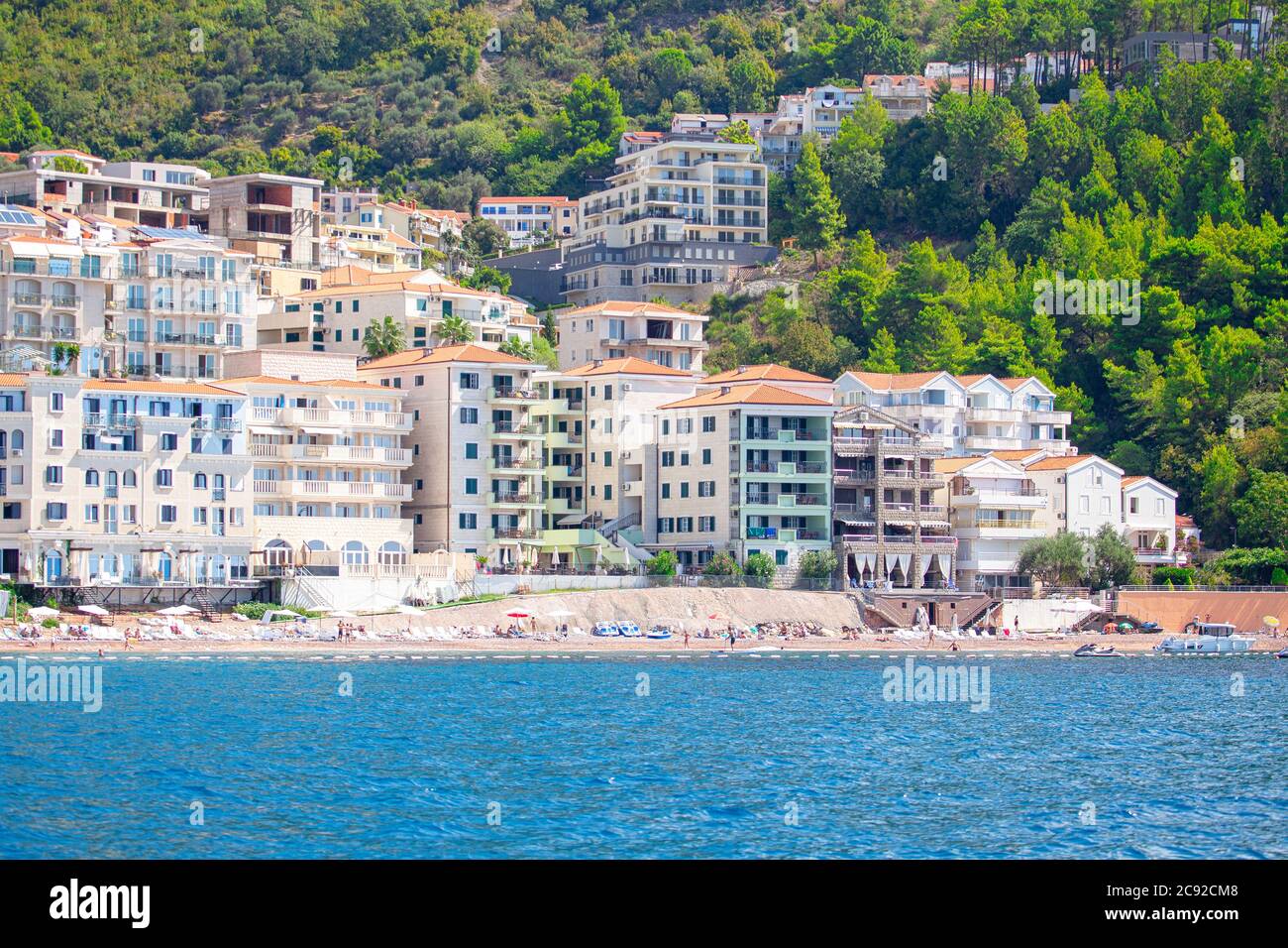Coastal touristic resorts . People on the beach . Summer vacation Stock ...