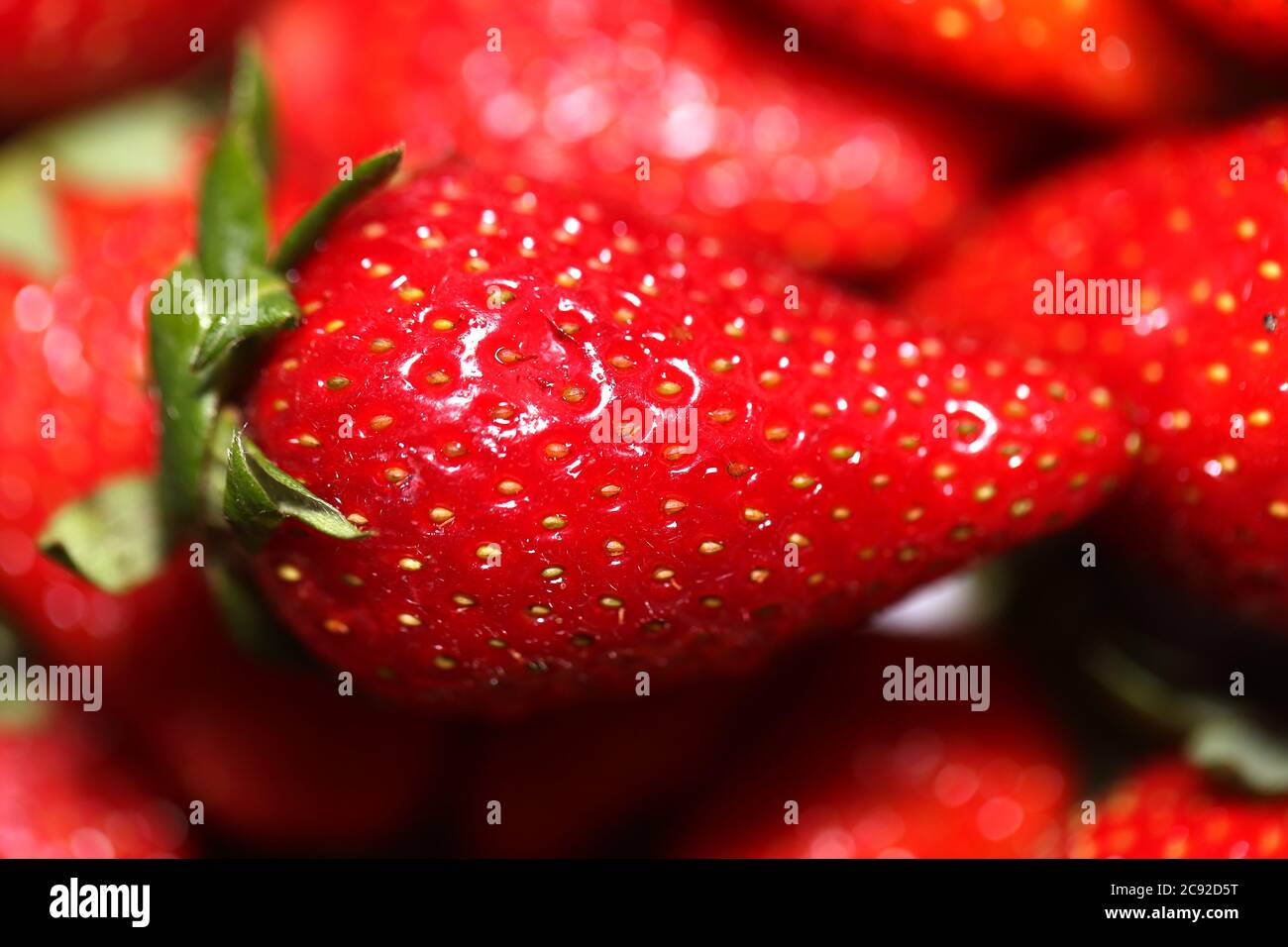 Photo macro red strawberry background Stock Photo - Alamy