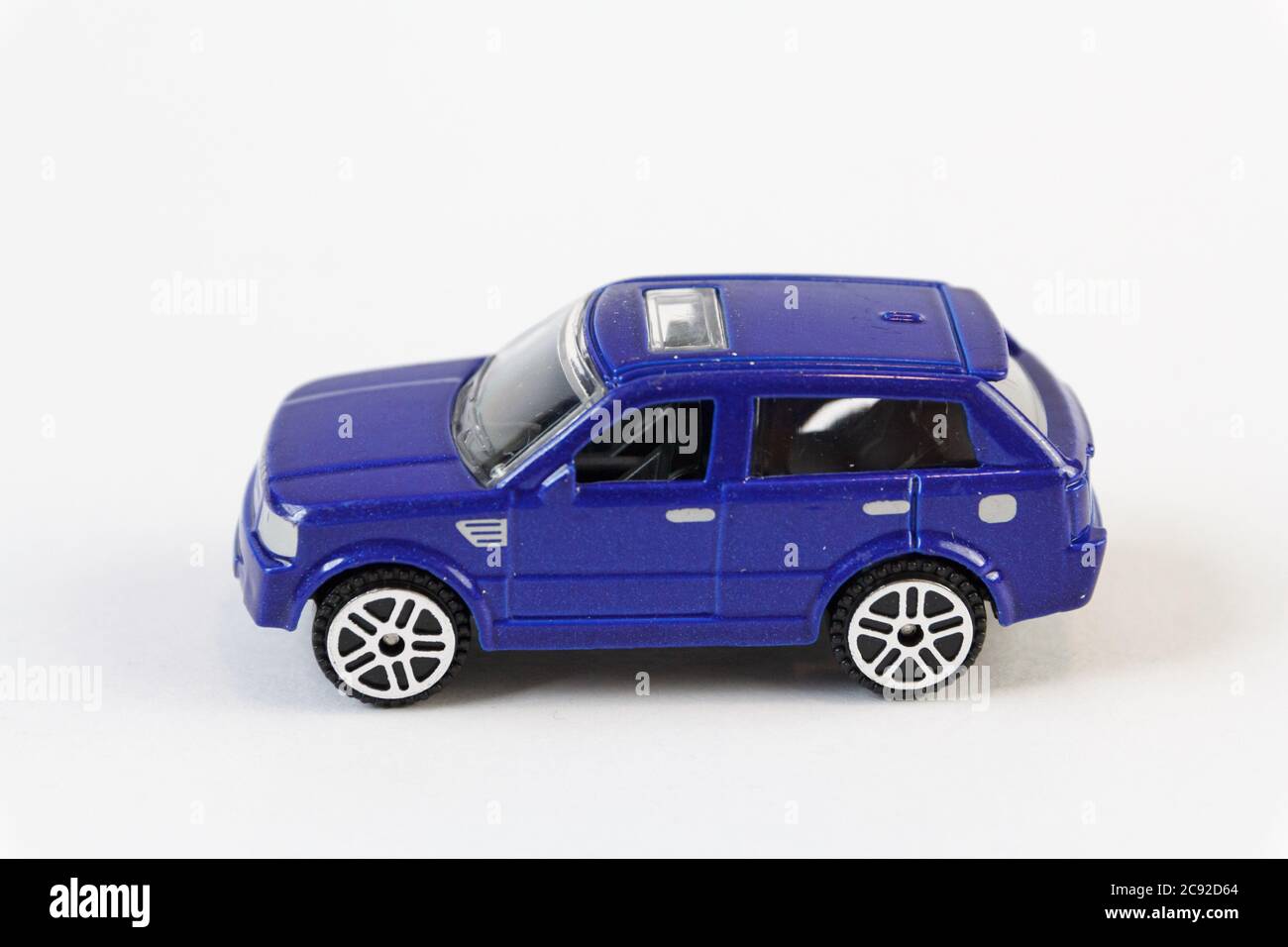 a little toy blue car with white background Stock Photo - Alamy