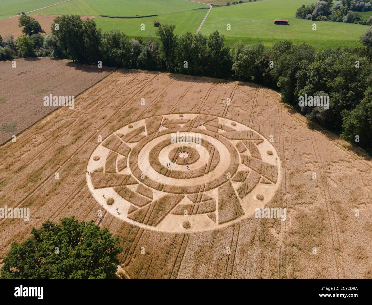 28 July 2020, Bavaria, Pähl: Interested people wander through a crop ...