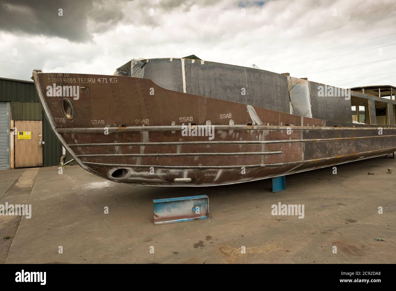 New build unfinished narrow boat hull Stock Photo - Alamy