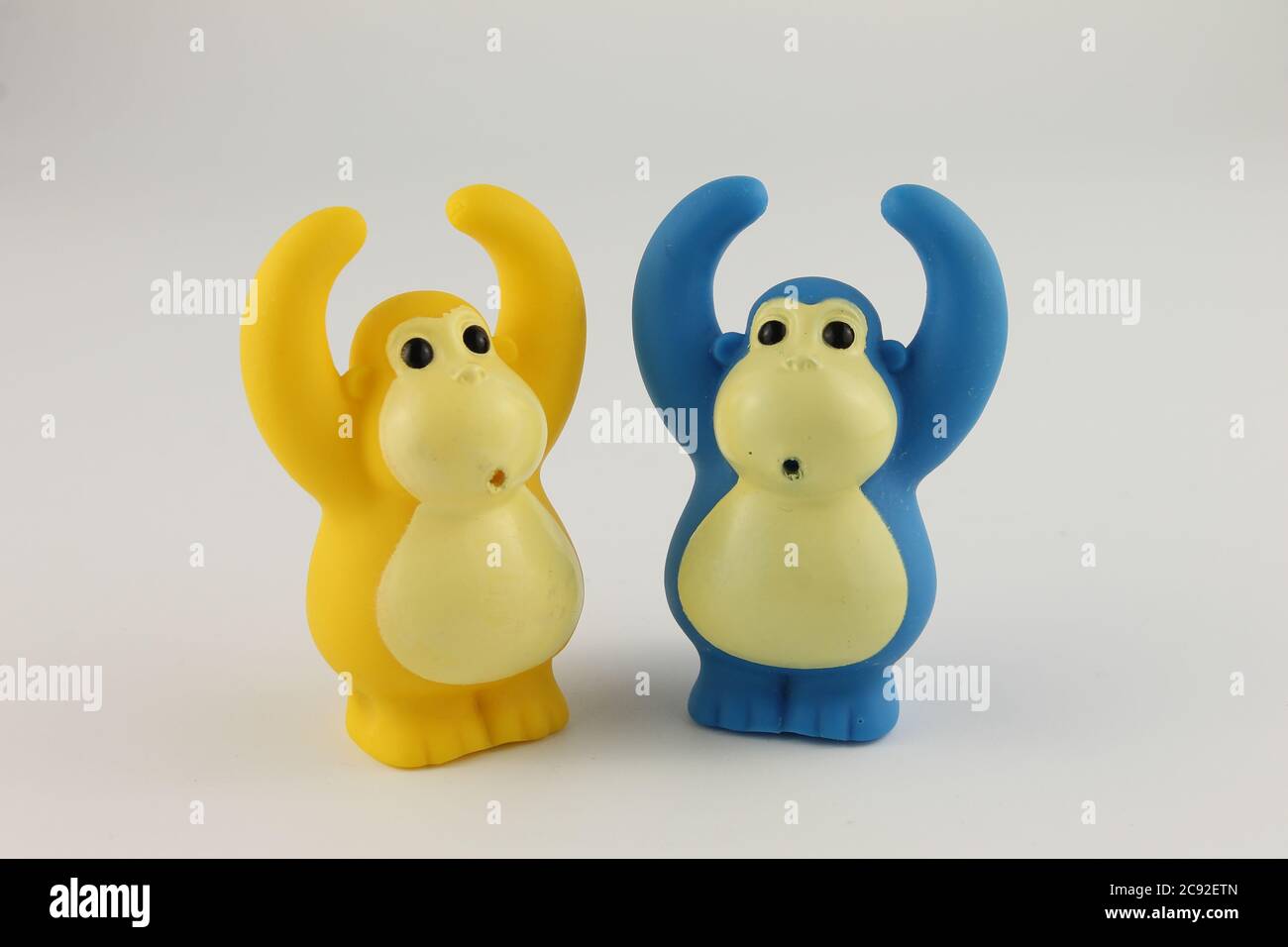 rubber monkeys bath toys, isolated on white background with copy space ...