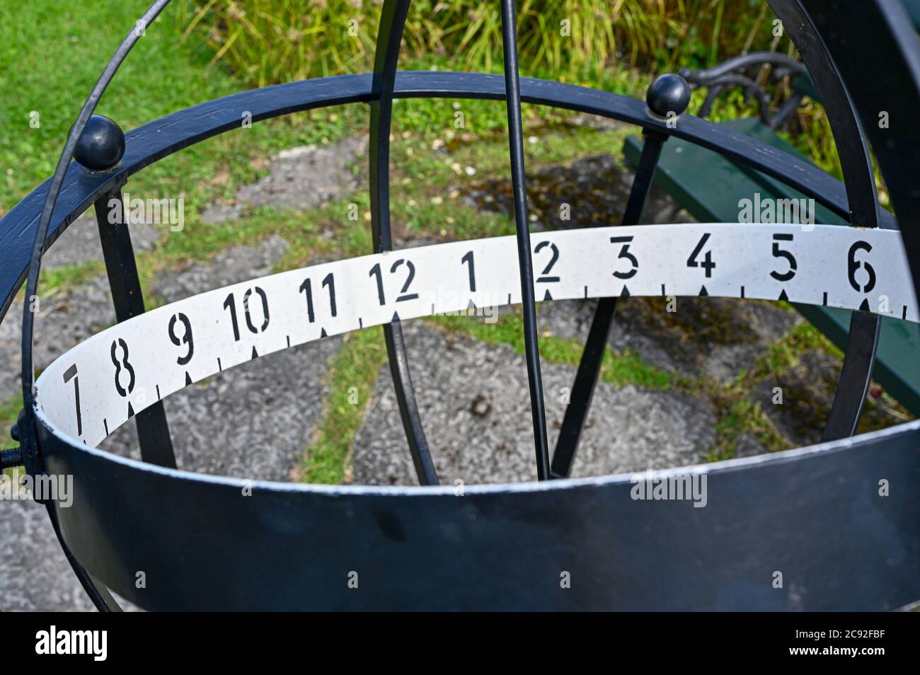 old sundial in a big Swedish garden Stock Photo - Alamy