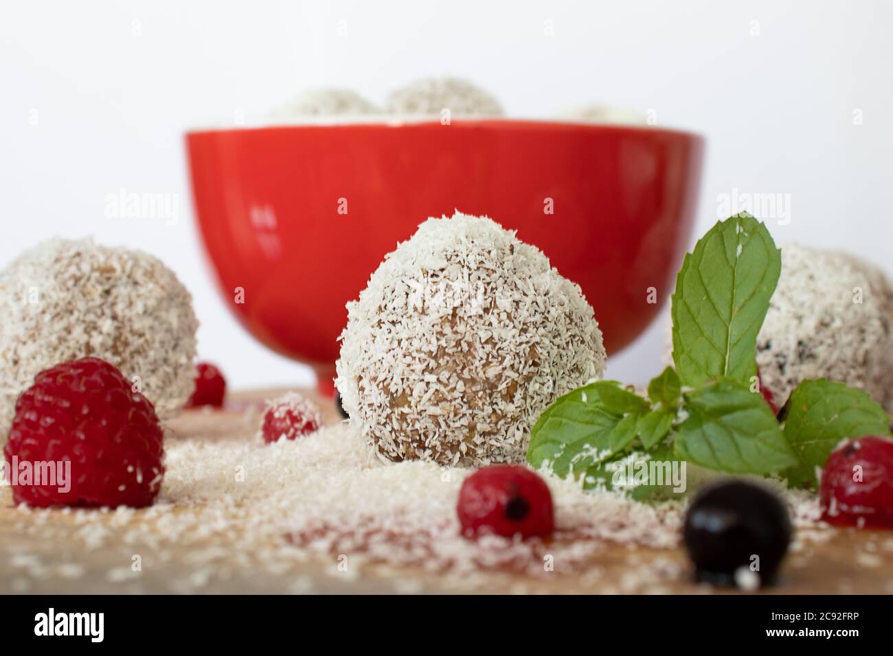 Healthy organic energy raw balls with coconut flakes, oatmeal, nuts ...