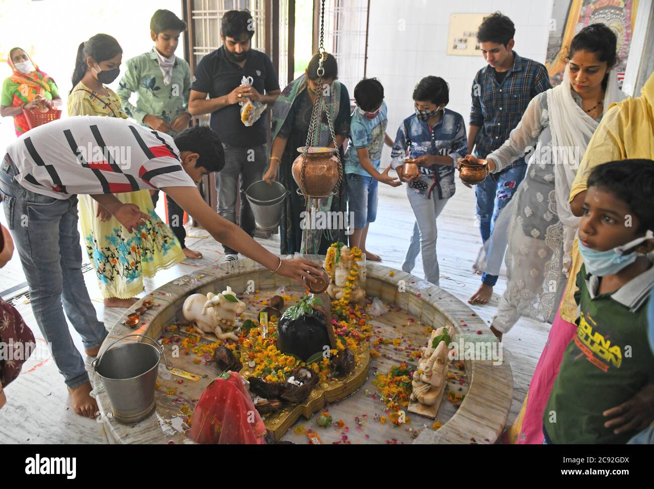 Beawar, Rajasthan, India, July 27, 2020: Devotees perform 'abhishek' of ...