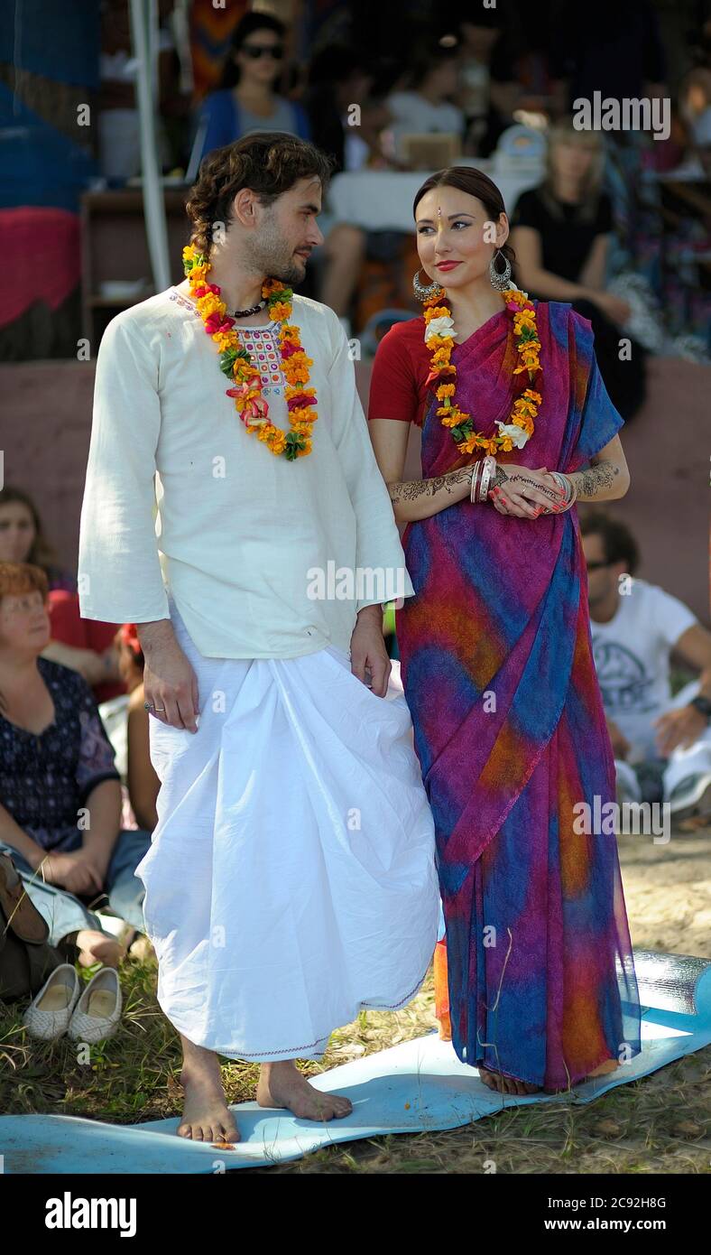 Vedic wedding. Bride and groom in wedding dresses waiting for the ...