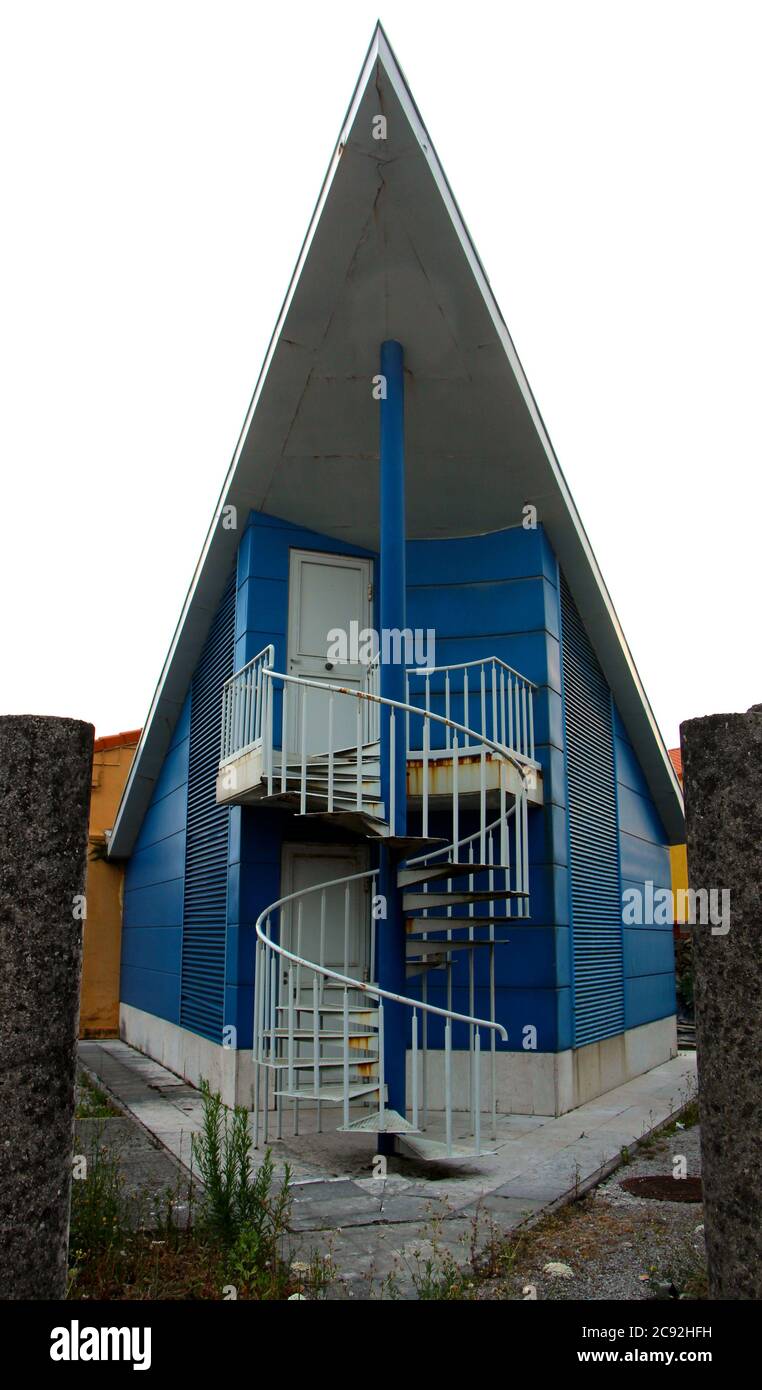 Blue building Telefonica copper wire telephone exchange with a white ...