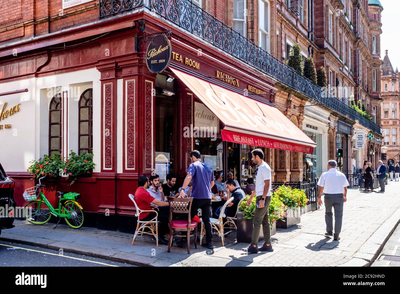Customers Sitting Outside The Richoux Cafe In South Audley Street ...